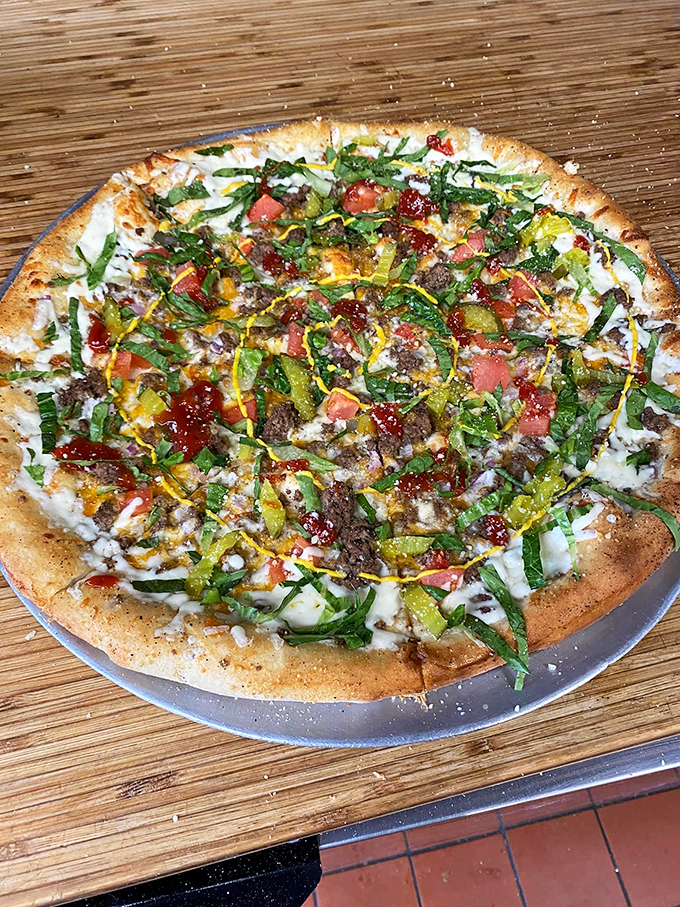 The cheeseburger pizza: for when you can't decide between fast food and Italian. It's the culinary equivalent of wearing a tux with sneakers.