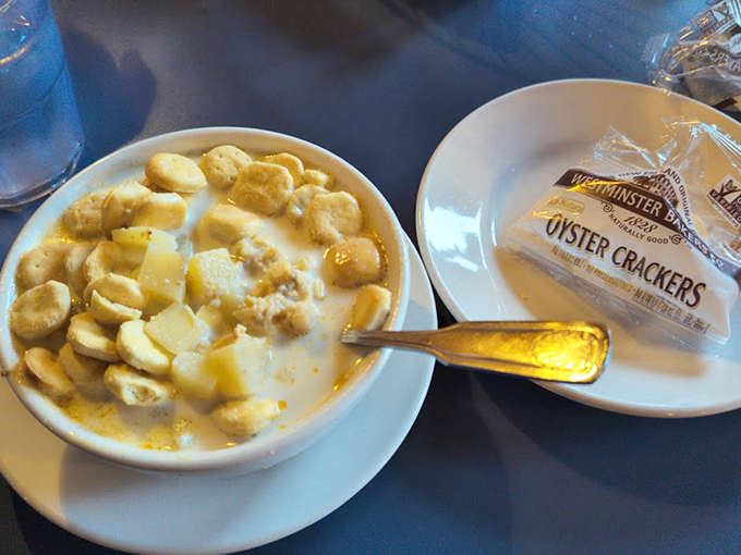 A bowl of classic New England clam chowder with oyster crackers standing by - winter comfort in a bowl. Photo credit: Michael P