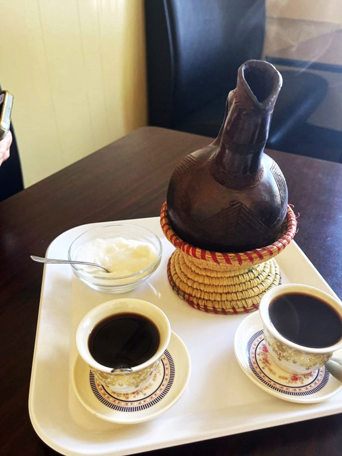 Traditional coffee service arrives with ceremony and style. That handcrafted pot isn't just for show - it's coffee theater!