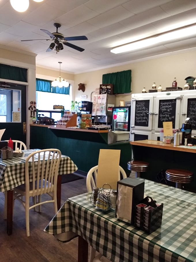 Checkered tablecloths and cozy booths: the unofficial uniform of small-town charm. It's like sitting in your grandma's kitchen, but with better coffee.
