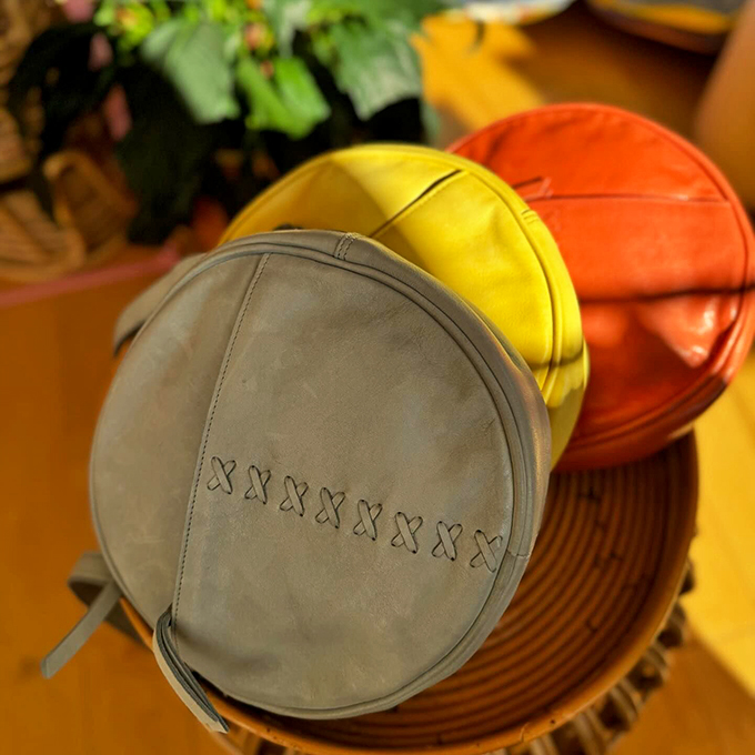 Carry your essentials in style! These round bags are the perfect blend of form and function, with a dash of whimsy thrown in for good measure.