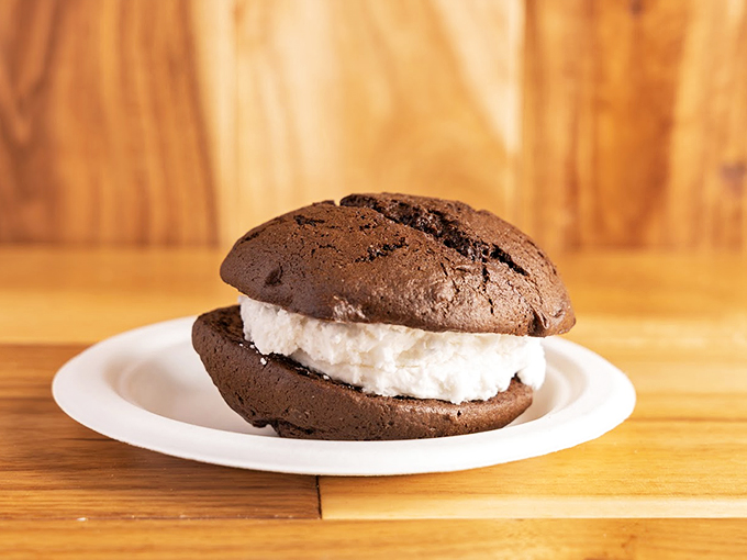 This whoopie pie looks like it's ready for its close-up - a classic Maine treat that's pure chocolate-vanilla bliss.