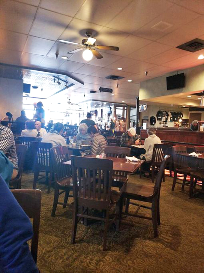 Happy diners, Batman! This bustling scene is proof that good food brings people together faster than you can say "cheese curds." Photo credit: Photo credit: Danielle K.