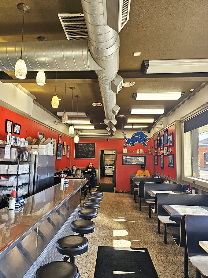 Retro chic meets modern eats! This dining area's got more personality than a 1950s sitcom, with comfort food to match.