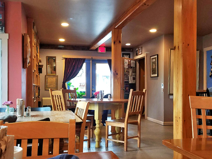 Rustic charm meets modern comfort in this dining area. It's like your grandmother's kitchen got a Pinterest makeover, and we're here for it.