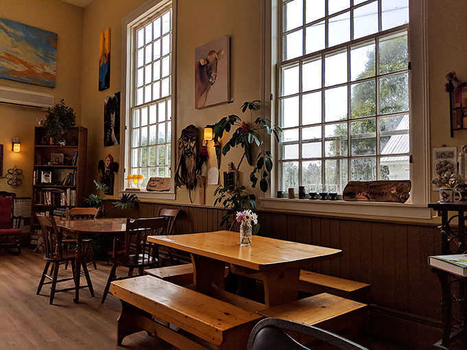 Rustic charm meets artistic flair! This dining area is like a warm hug for your soul, with a side of inspiration.