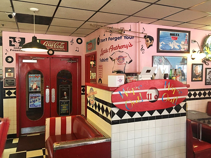 Musical notes dance across pink walls while red doors welcome visitors into this time capsule of American dining culture.