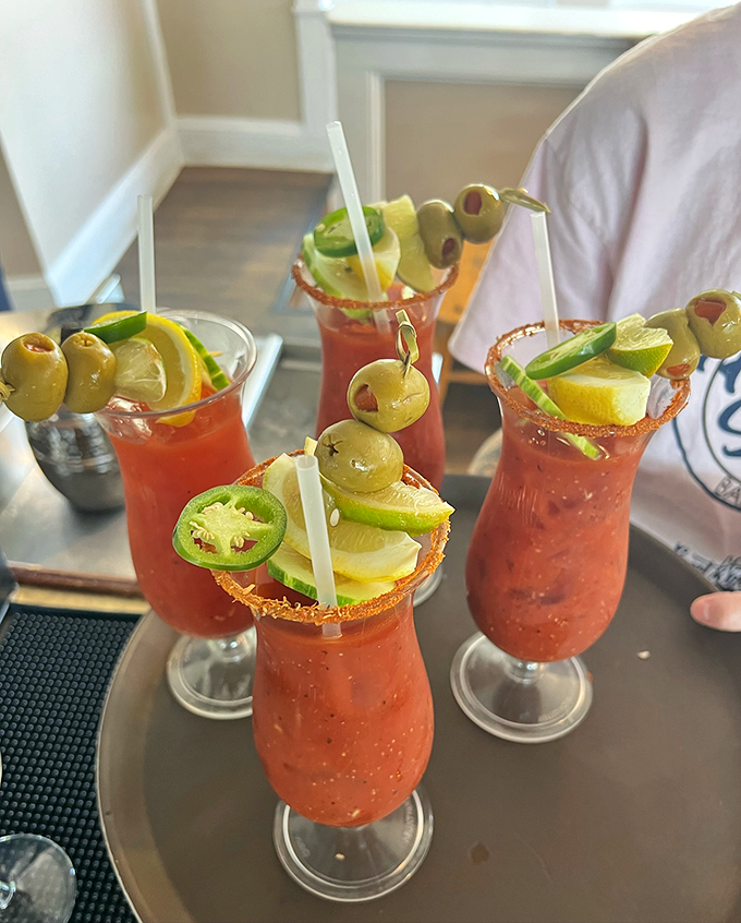 These Bloody Marys come dressed to impress, sporting more garnishes than a Kentucky Derby hat.