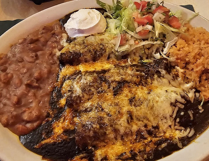 Smothered in rich sauce and melted cheese, these enchiladas are what comfort food dreams are made of.