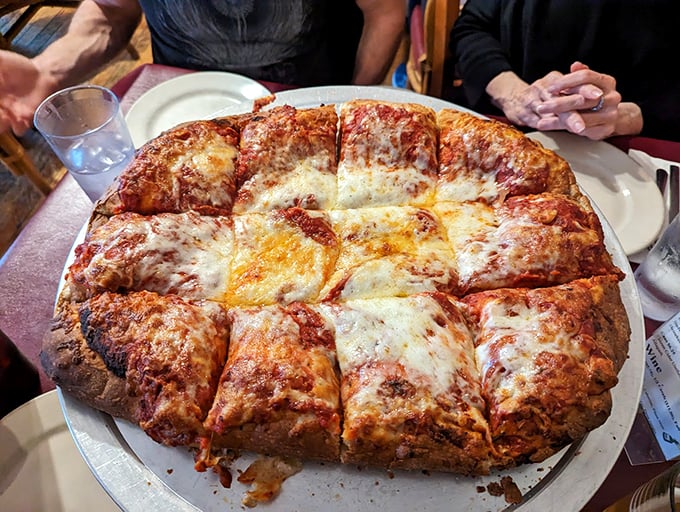 Pizza perfection! Each slice is a beautiful balancing act of crispy crust, gooey cheese, and toppings that'll make your heart sing.
