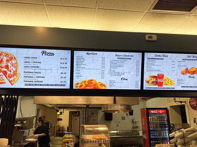 Modern digital menu boards showcase bowling alley classics, because nothing says 
