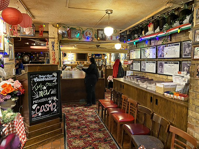 Welcome to the heart of the hustle! This front desk is where pasta dreams come true. Notice the chalkboard &ndash; it's whispering sweet nothings about today's specials.