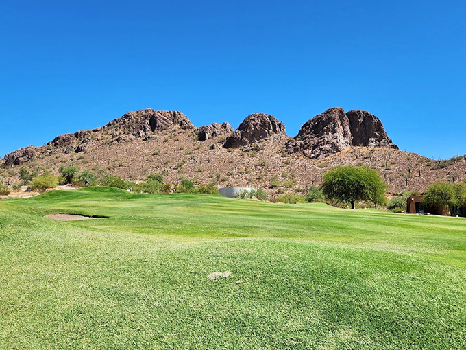 Where the green meets the golden. This hole offers a perfect blend of challenge and charm, framed by nature's own gallery.