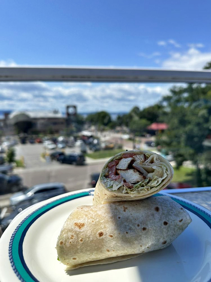 Wrapped and ready for adventure! This grilled chicken club is like a bear hug for your taste buds - comforting and exciting all at once.