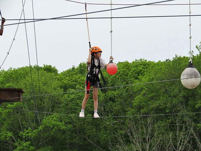 The cargo net climb: Where childhood dreams of being a pirate meet modern-day fitness goals. Photo credit: Take Flight Aerial Adventure Park