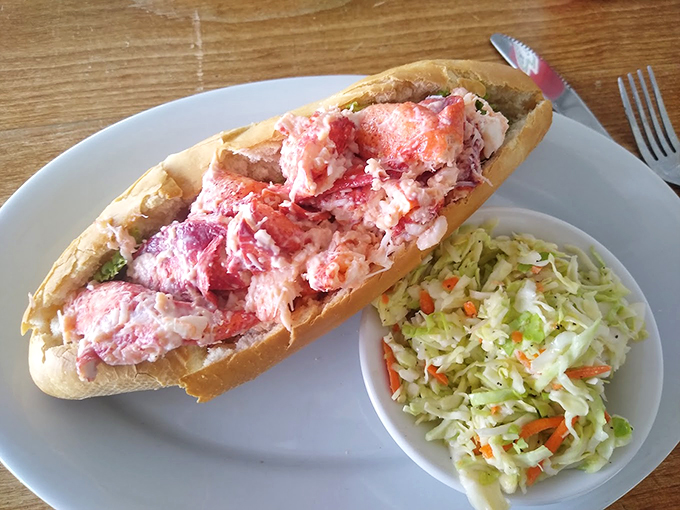 This lobster roll is so packed with fresh meat, it's practically doing bicep curls in that toasted bun. Photo credit: Torrey Pearson