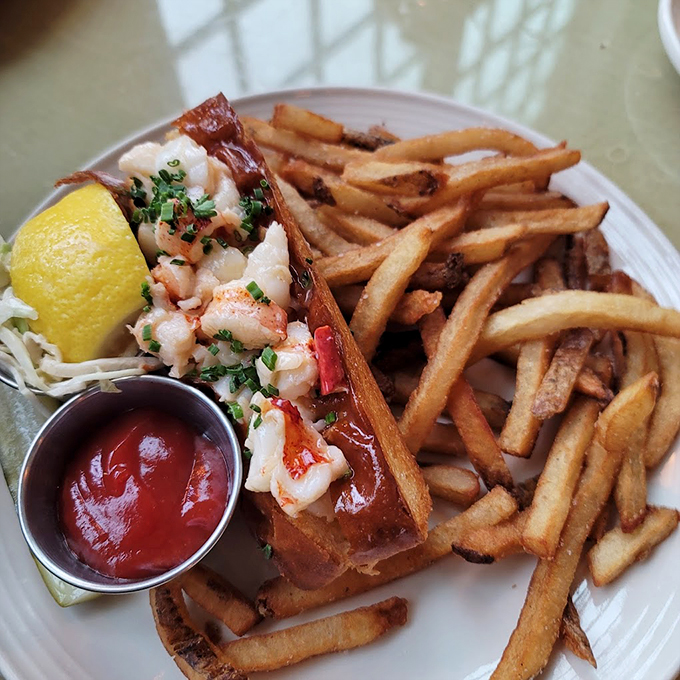 The lobster roll arrives like Maine royalty &ndash; sweet meat dressed simply, letting the ocean's finest work speak for itself. Photo credit: Linda Cichocky