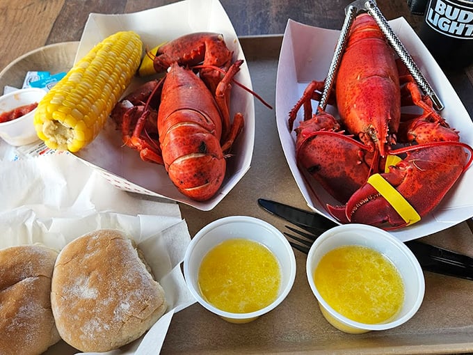 Two crimson kings of the sea, served with corn and rolls - a feast fit for maritime royalty. Photo credit: Alexis B&eacute;rard