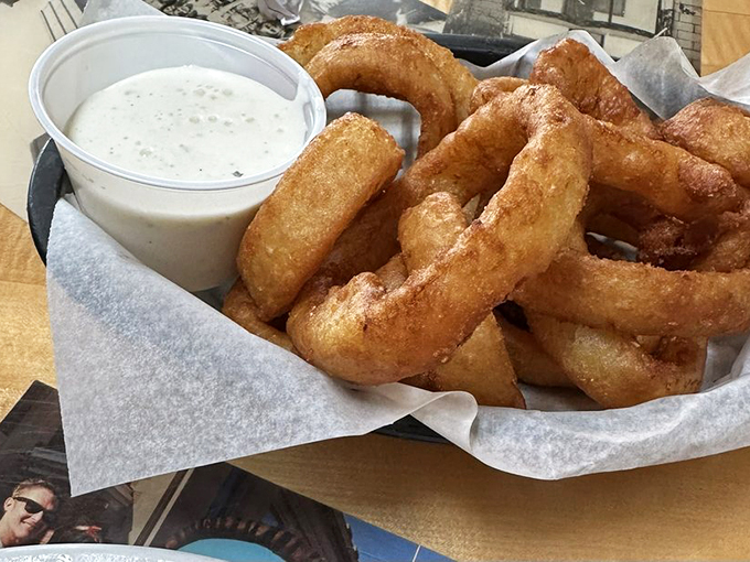 Crispy, golden hoops of joy! These onion rings aren't just a side dish, they're edible jewelry for your taste buds. Don't forget to accessorize with ranch!