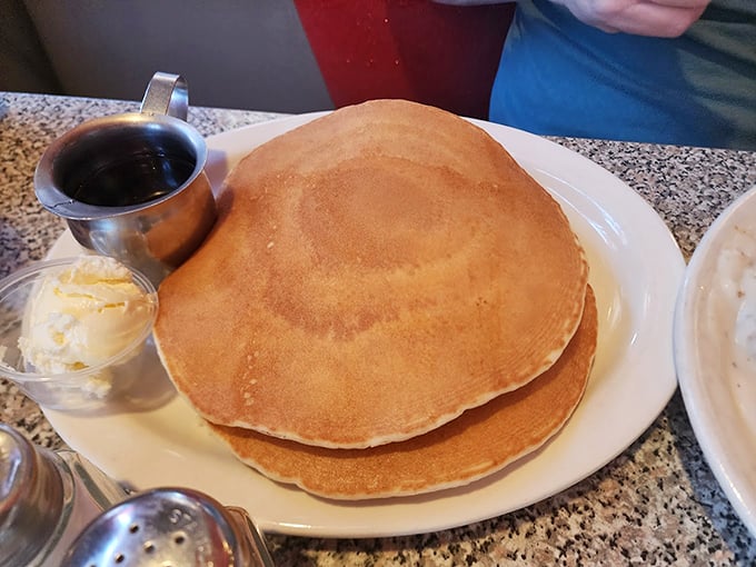 These pancakes are bigger than your average vinyl record and twice as satisfying. Butter melting into every fluffy layer. Photo credit: Jennifer Chesley