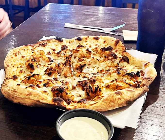 Perfectly charred crust meets melty cheese in a pizza that would make any Italian grandmother nod in approval.