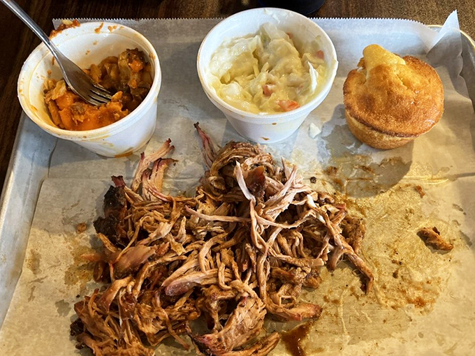 Pulled pork that's been treated with respect, accompanied by sides that refuse to play second fiddle.