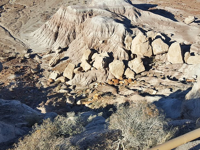 Nature's Jenga game gone wild. These rocks have been stacked and scattered by the hands of time, creating a geological playground.