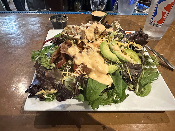 A garden-fresh salad that proves healthy eating doesn't mean sacrificing flavor, topped with creamy house-made dressing. Photo credit: Bradley Stratz