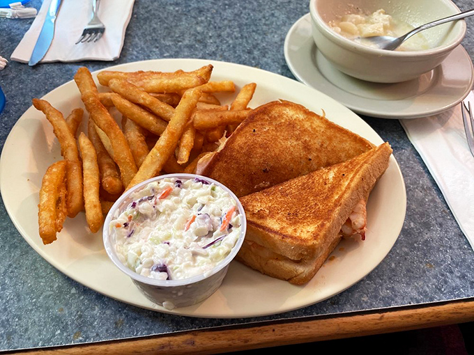 Sometimes simple is best - a perfectly grilled sandwich with fresh coleslaw. Comfort food that speaks to the soul.