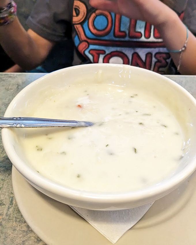 A bowl of creamy comfort that proves sometimes the best breakfast companion isn't coffee, but a warm, soothing soup.