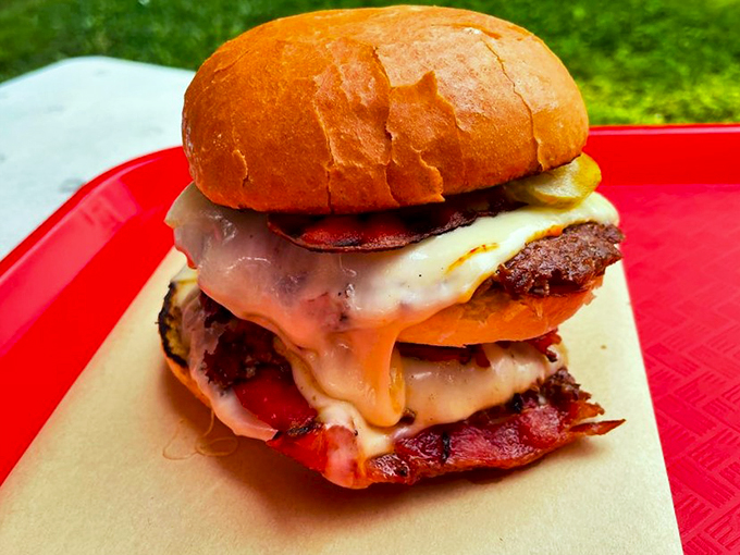 Three's company when it comes to this towering masterpiece served on a bright red tray of joy.