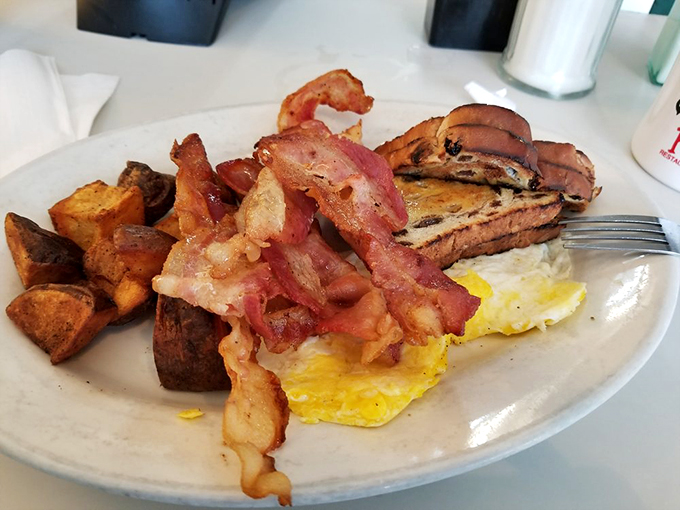 Simplicity at its finest. Sometimes, all you need is perfectly cooked eggs, crispy potatoes, and buttery toast to start your day right.