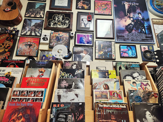 Album covers tell stories of rock legends while movie posters remind us of cinematic classics we grew up loving.