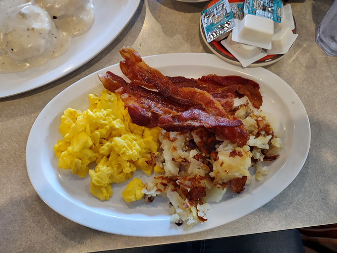 Bacon, eggs, and potatoes: the holy trinity of breakfast. This plate is so good, it should come with a warning label.
