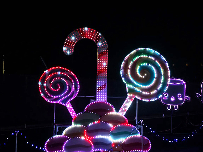 Candy canes and lollipops, oh my! It's like Willy Wonka decided to open a drive-thru. Warning: may induce sugar cravings and childlike wonder.