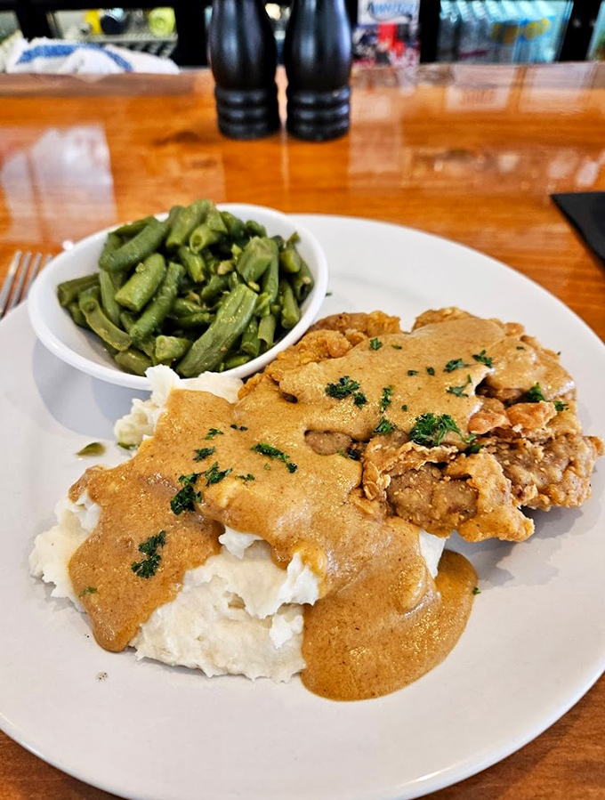 This country fried steak is so good, it will make you want to two-step. It's comfort food that gives you a warm, buttery hug from the inside out.