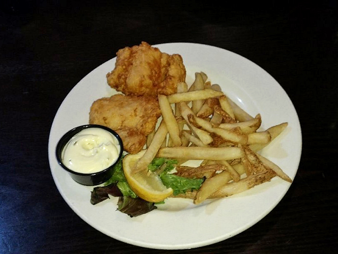 The main event: fish and chips that could make a mermaid consider legs! Crispy, flaky, and ready to transport you to a seaside paradise.