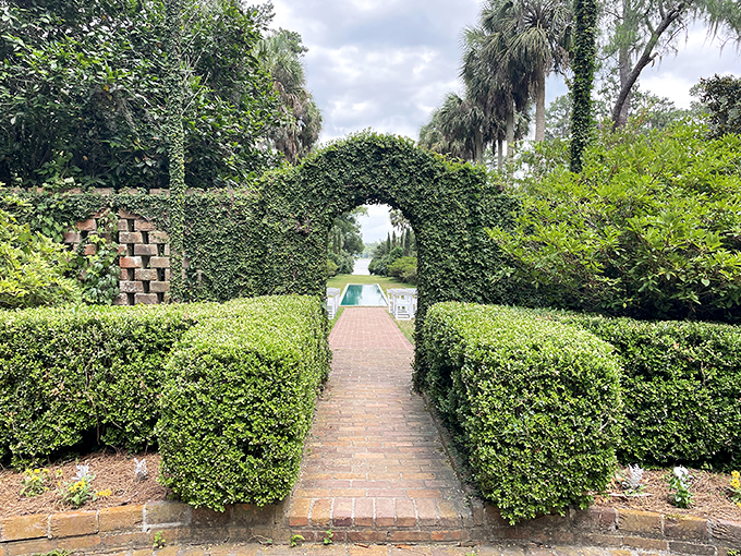 Secret garden vibes: Through this archway lies a world of botanical wonders. It's like Narnia, but with better landscaping and fewer talking animals. Photo credit: V V