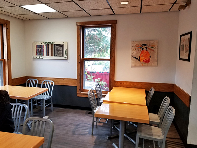 Cozy corners and local charm! This dining area feels like the living room of your coolest friend &ndash; the one who always has the best snacks.