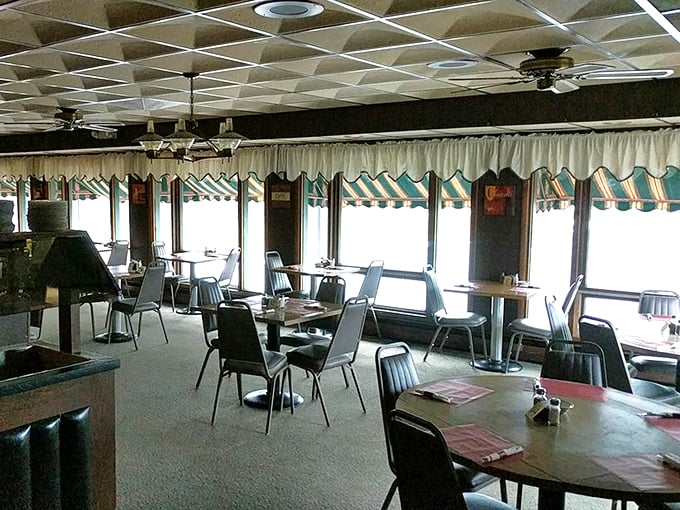 Cozy corners and checkered curtains &ndash; this dining room is like a warm hug from Wisconsin itself. Just add cheese curds for the full experience!