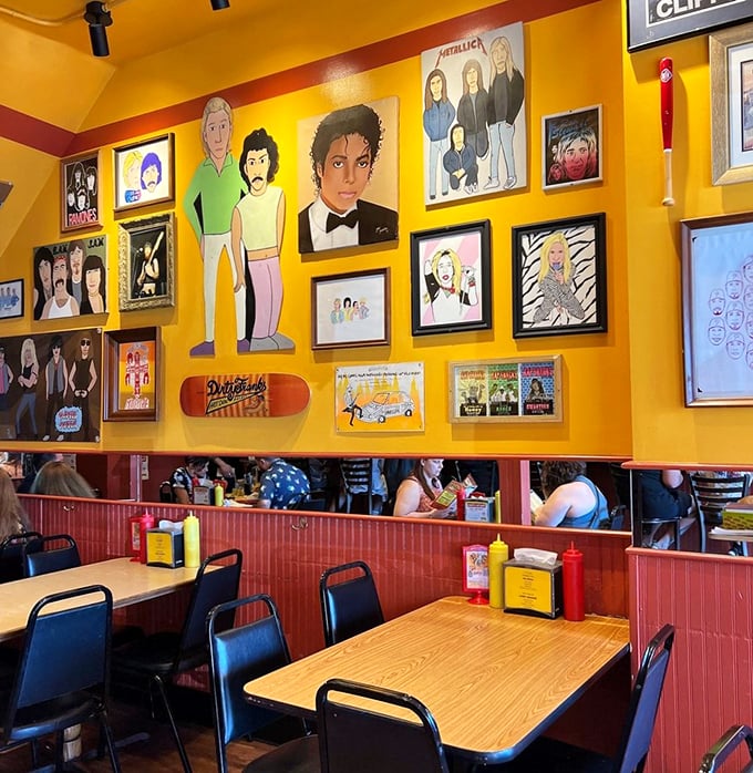 Wall of fame or wall of YUM? The vibrant artwork and pop culture references create a feast for the eyes to match the feast on your plate.