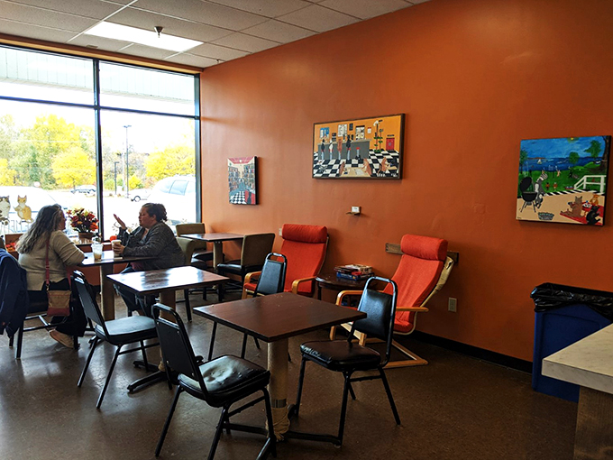 Orange you glad you came? The cafe's warm hues and quirky decor create an atmosphere that's equal parts cozy and playful.