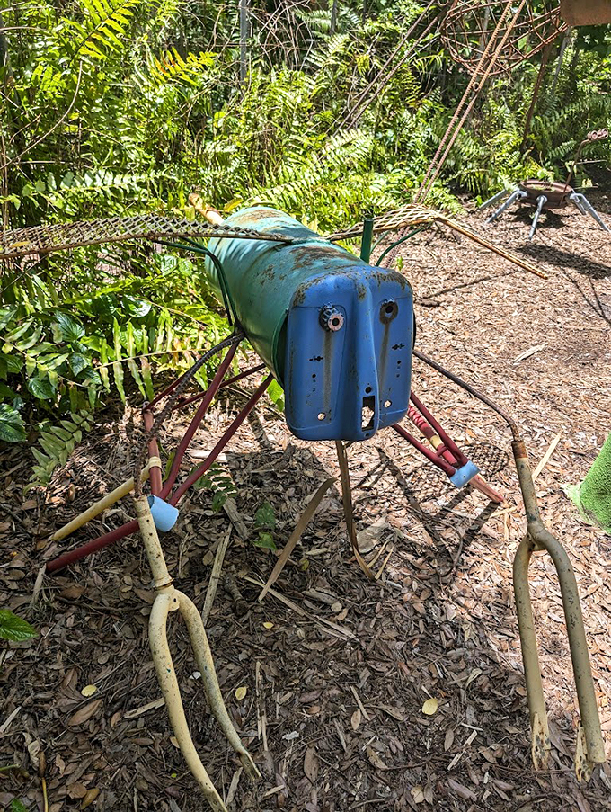 Meet the garden's resident tin man! This quirky metal fellow looks like he stepped right out of a steampunk fairytale.