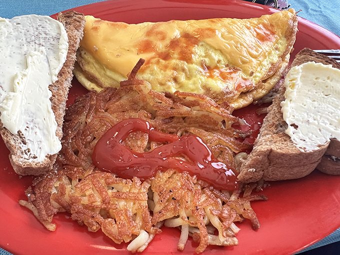 Cheese lovers, rejoice! This omelet is so fluffy and cheesy, it's like sleeping on a cloud made of cheddar. Dreams do come true! Photo credit: G S