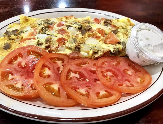 Omelet or modern art? This eggy masterpiece has more colors than a Bob Ross painting. 