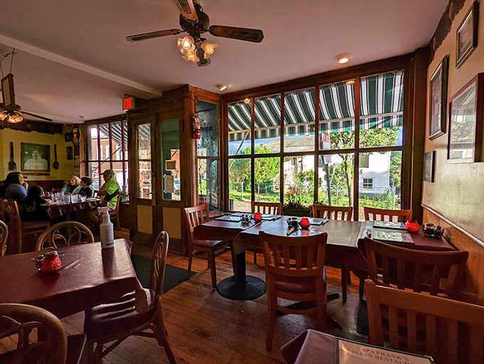 Sunlight streams in, illuminating tables set for culinary adventures. It's like a scene from "Under the Tuscan Sun," Vermont edition.