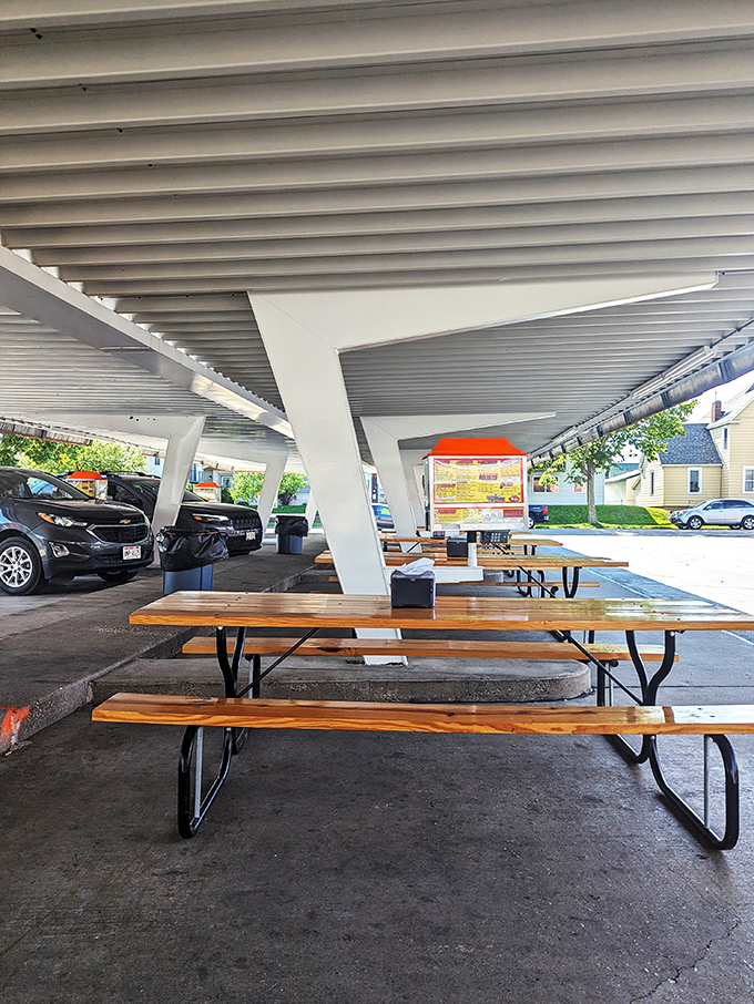 Picnic tables with a side of nostalgia. Rudy's outdoor seating area is the perfect spot for your impromptu "American Graffiti" reenactment.