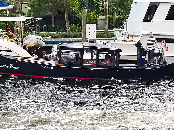 All aboard the S.S. Serenity! This gondola slices through the water smoother than a hot knife through Florida butter.
