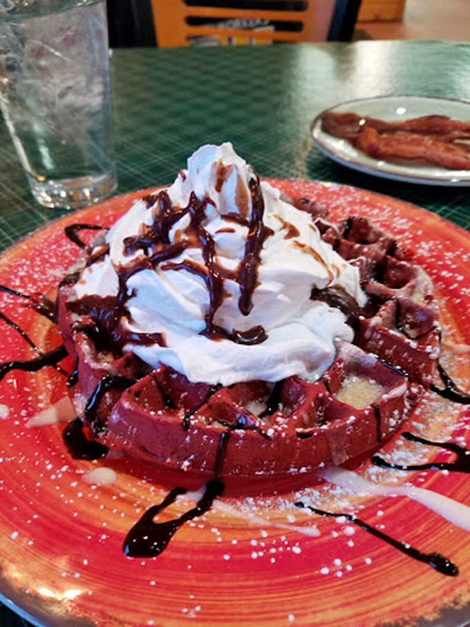 Move over, Eggo! This waffle is stacked higher than a Jenga tower and sweeter than your first kiss. It's a breakfast skyscraper that'll have you saying, "Leggo my Connie's!"