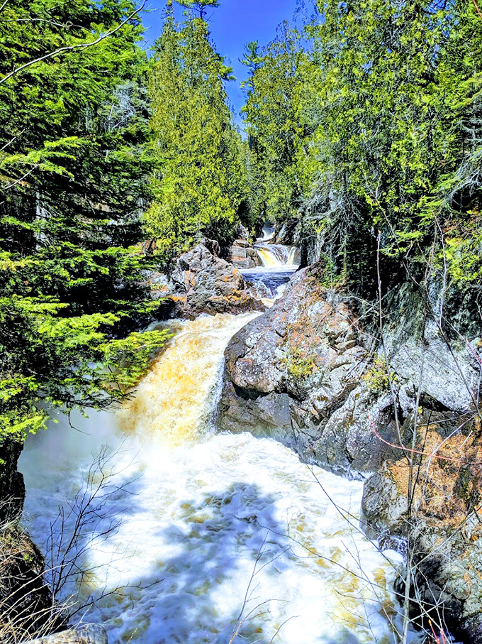 Nature's own water park! Cascade Falls serves up a buffet of aquatic delights, no inflatable unicorn float required.